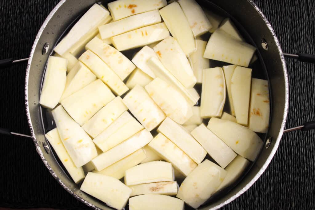 Vegan Roasted Parsnips with Cheesy Herb Coating - The Pesky Vegan